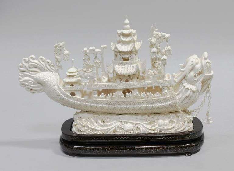 CHINESE CARVED IVORY DRAGON BOAT - Hodgins Halls Auction Group