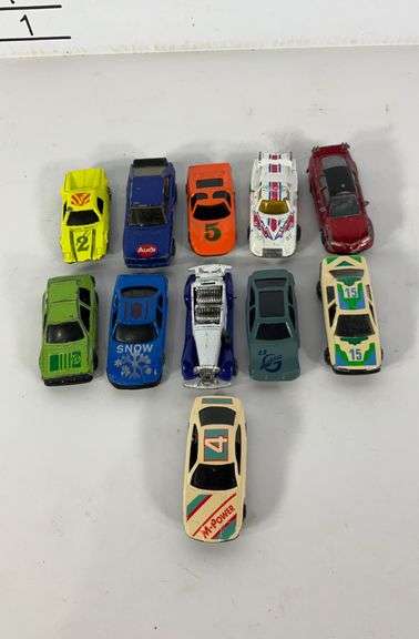 11 matchbox type cars. 1 is Matchbox - Hash Auctions