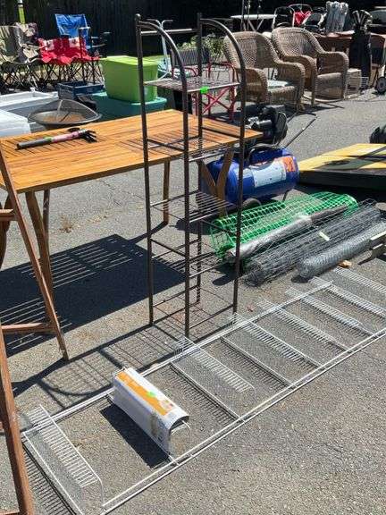 Two racks, one closet maid 8 tier rack new, other self standing ...