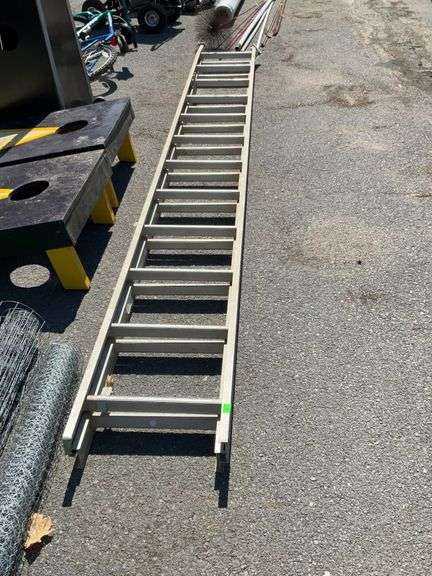 24ft Aluminum extension ladder, Note foot end has damage as shown ...