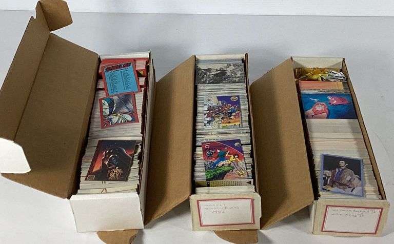 Three boxes of collector trading cards, includes Star Wars, Lion King ...