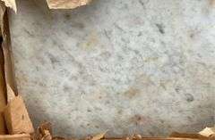 Marble slab, still in wooden shipping crate, about 21”x46” or so ...