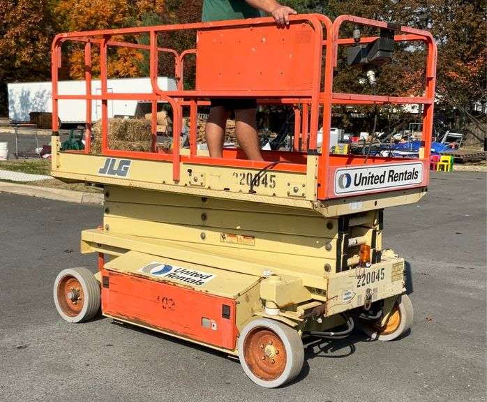 JLG Scissor Lift, model 2658E. Electric battery operated with three of ...