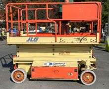JLG Scissor Lift, model 2658E. Electric battery operated with three of ...