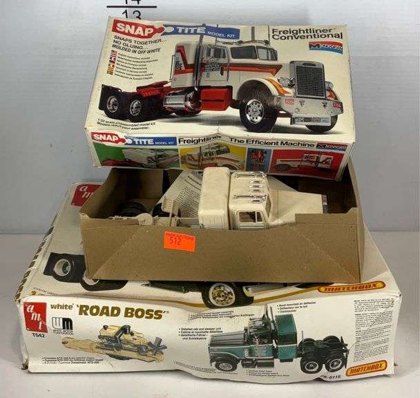 Two matchbox Snap Tite models, white road boss and freight liner ...