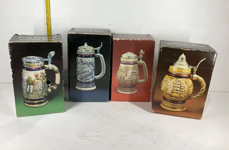 Four Avon beer steins with boxes - Hash Auctions