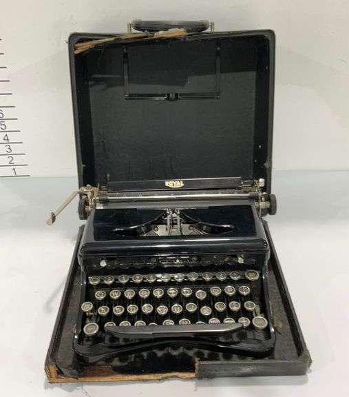 Royal Typewriter in case, case shows wear, condition as shown, seller ...