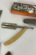 Four straight razors, G.I. Jack pocket knife, folding ruler, and two ...