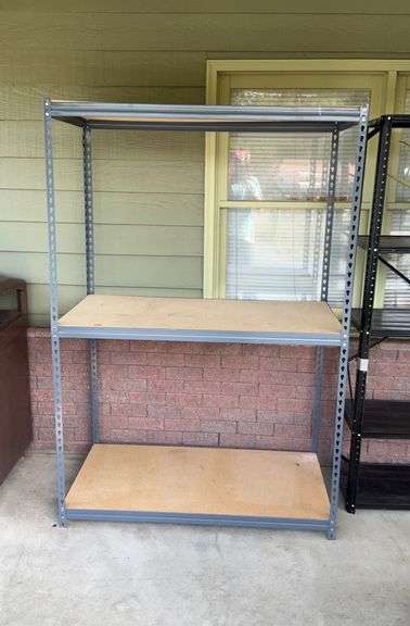 Garage/Shop shelf. Metal and presswood. 4’x2’x6’ - Hash Auctions