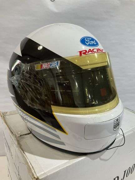 CD racing helmet shaped CD radio with remote - Hash Auctions