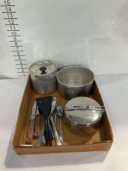 Flat of camping cookware. Flatware, two pots marked Japan, and a ...