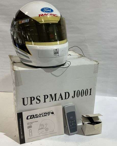 CD racing helmet shaped CD radio with remote - Hash Auctions