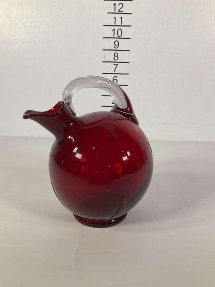 Ruby red pitcher with applied clear glass handle - Hash Auctions