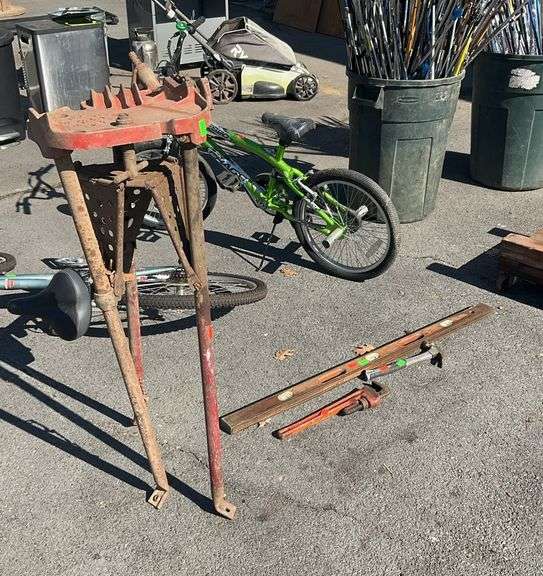 Level, claw hammer,rigid pipe wrench, and tripod pipe bender, pipe ...