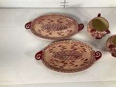 Two Temp-tations handled platters 12x7.5in and two Temp-ration pig ...