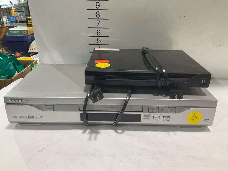 Sharp dvd/cd player and a blu-ray dvd player. Both power on. - Hash ...