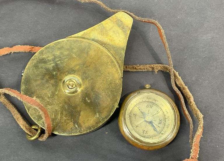 Brass Musket capper and a compass - Hash Auctions