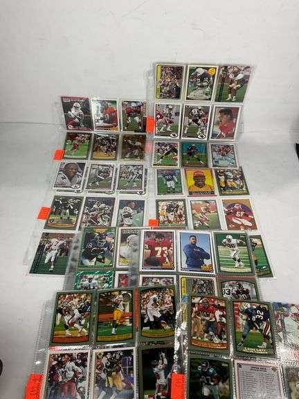 Sport cards. collection of football trading cards organized in plastic ...