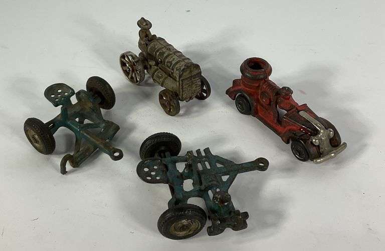 Group of four cast iron toys - Hash Auctions