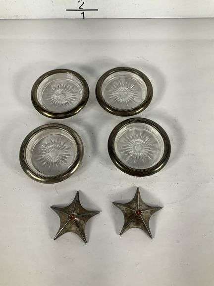 Two Dansk candle holders and four starburst coasters - Hash Auctions