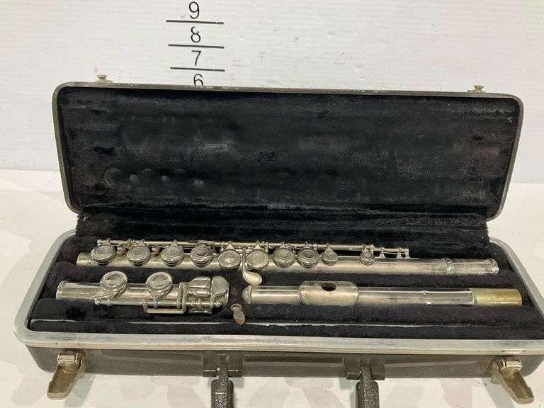 Bundy flute, made in the USA, featuring silver-plated construction ...