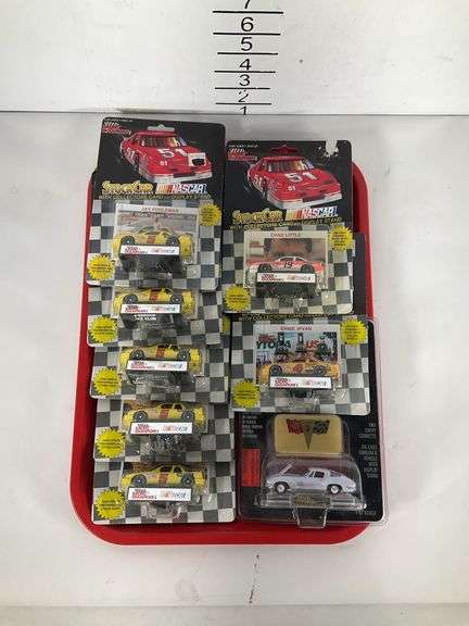 NASCAR Jay Fogleman, Chad Little, and Ernie Irvan stock cars and a 1963 ...