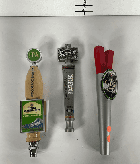 Henry Weinhard’s IPA, Berghoff, and Victory beer tap handles. - Hash ...