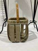 Two pillar candle holders and a basket with damage. - Hash Auctions
