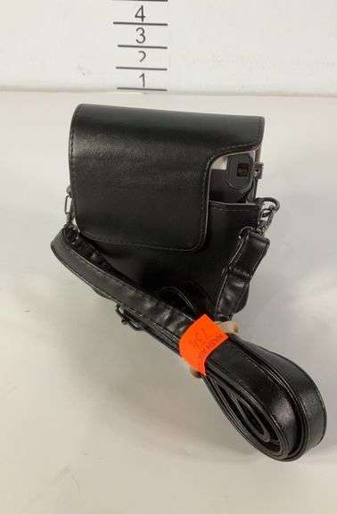 Fuji Film instax mini 70 in a Don’t touch my camera case. Flash is ...