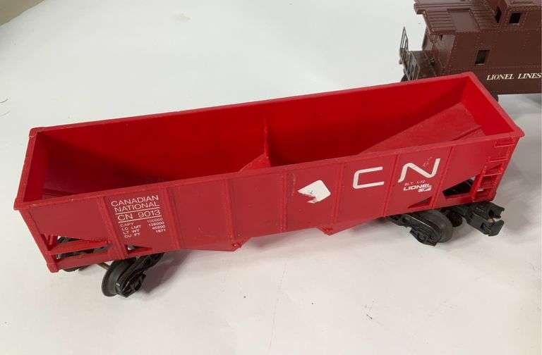 6 trains. Wabash 80982, Sunoco tanker, Lionel Lines 1007, Lionel 6059 ...