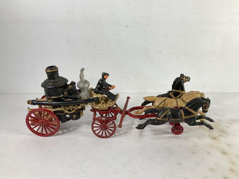 Large cast iron horse drawn fire engine wagon toy, 21” long - Hash Auctions