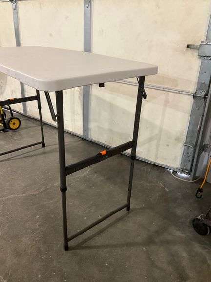 Adjustable height folding 4’ Lifetime table, 3 positions, 22”, 29”, and ...