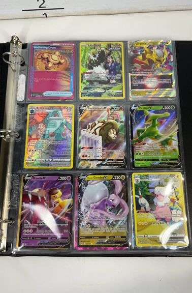 18 Pokémon cards in binder rare inserts - Hash Auctions