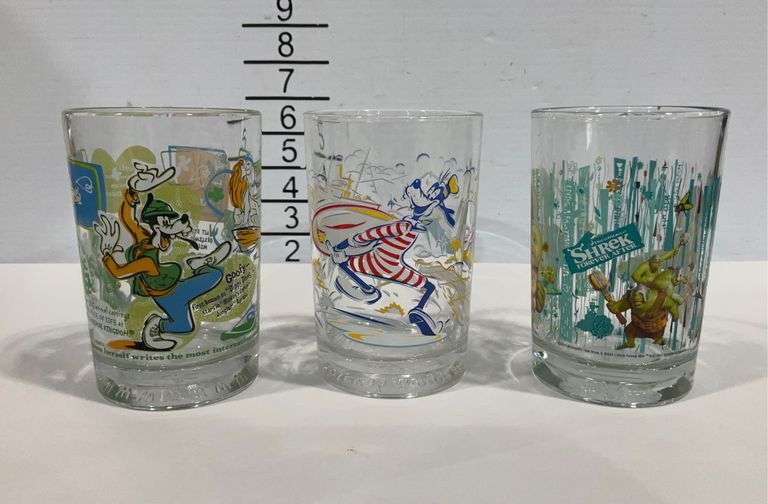 Three collector’s glasses, Shrek Forever After McDonalds, Disney “Remember the Magic” 25th ...