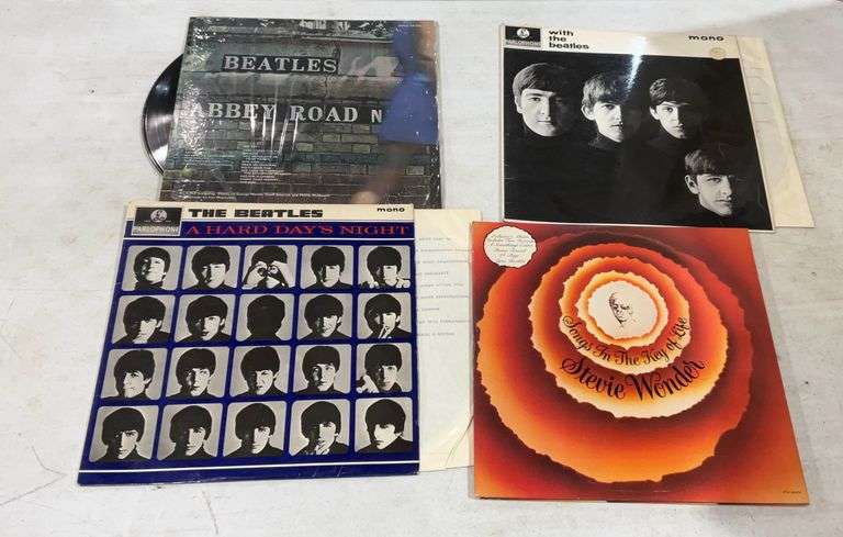 Four 33 rpm records, three Beatles Abbey Road, with the Beatles, and a ...