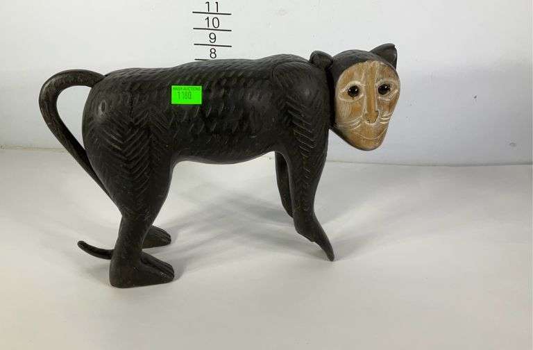 Hand carved monkey. - Hash Auctions