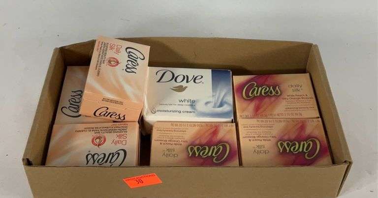 Six bars of Caress and a bar of Dove soap. - Hash Auctions