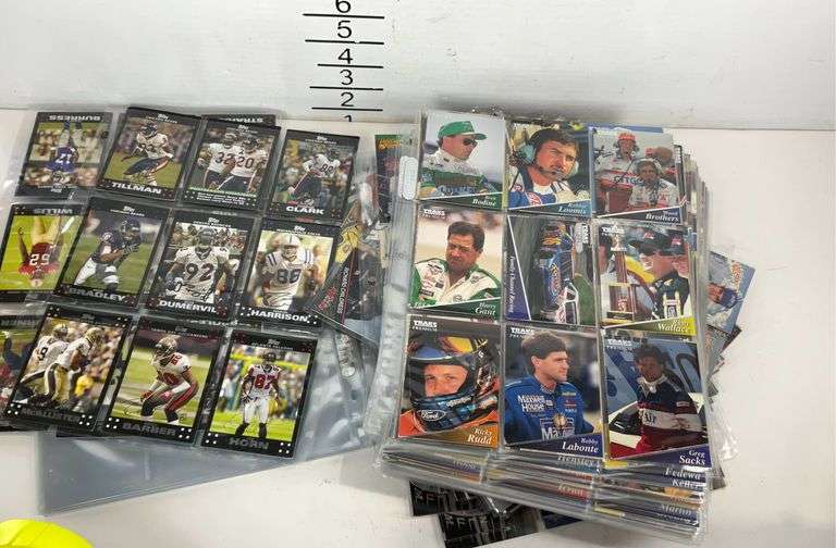 Large stack of sport cards a couple sheets are football the rest are ...