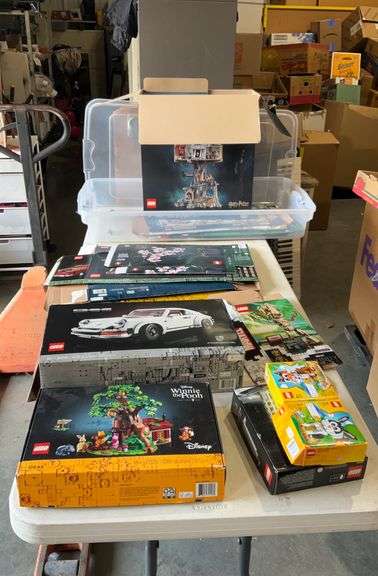 Large group of empty Lego boxes all different themes - Hash Auctions