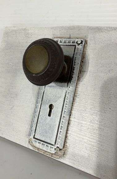 Wall art, repurposed door knobs, 31in wide - Hash Auctions