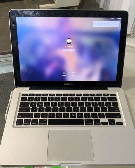 MacBook Pro is locked and sells as is serial no w8047rk2atm - Hash Auctions