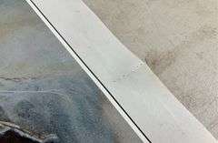 Unframed print, “Your Place or Mine” by M. Scavel, has rip and spots ...