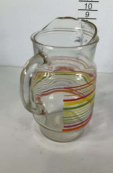 Vintage glass pitcher. Multi colors. - Hash Auctions