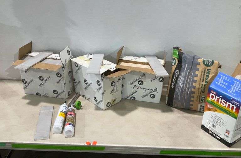 Miscellaneous group. Boxes of tiles. Grout, ect. - Hash Auctions
