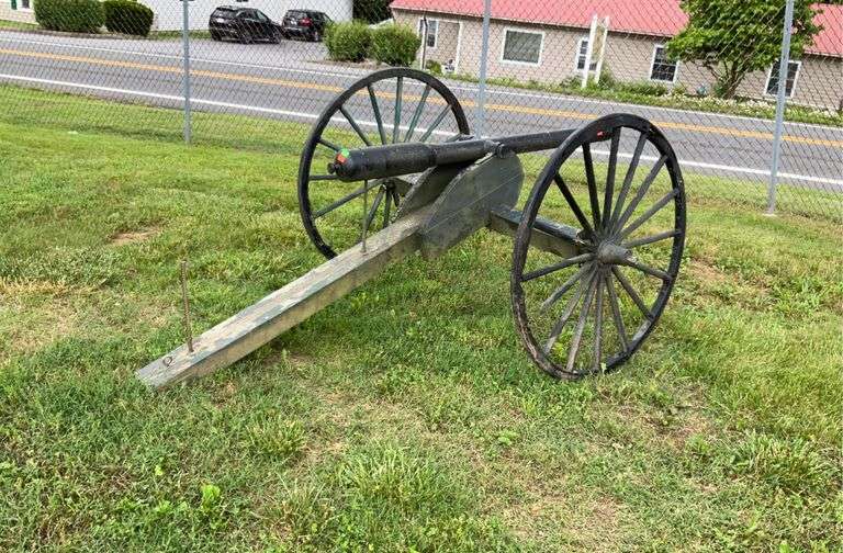Cannon, decorative,barrel is 64”L on wooden frame with wooden wheels 42 ...