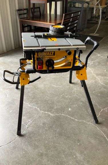 DeWalt 15amp corded table saw on stand, works as should, missing nuts ...