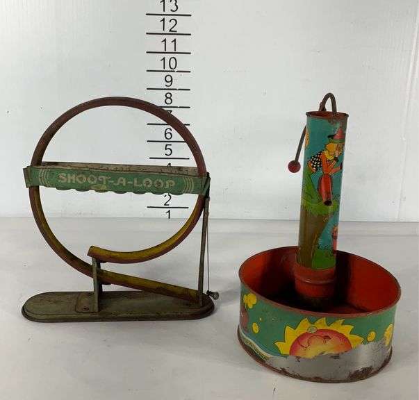 Vintage Shoot A Loop marble game and a toy pump and well. - Hash Auctions