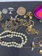 Foreign coins, ring dish, misc jewelry some is tangled, plated spoon ...