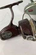 Three fishing reels. King Neptune, South Bend and Heddon. - Hash Auctions