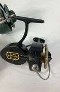 Three fishing reels. King Neptune, South Bend and Heddon. - Hash Auctions